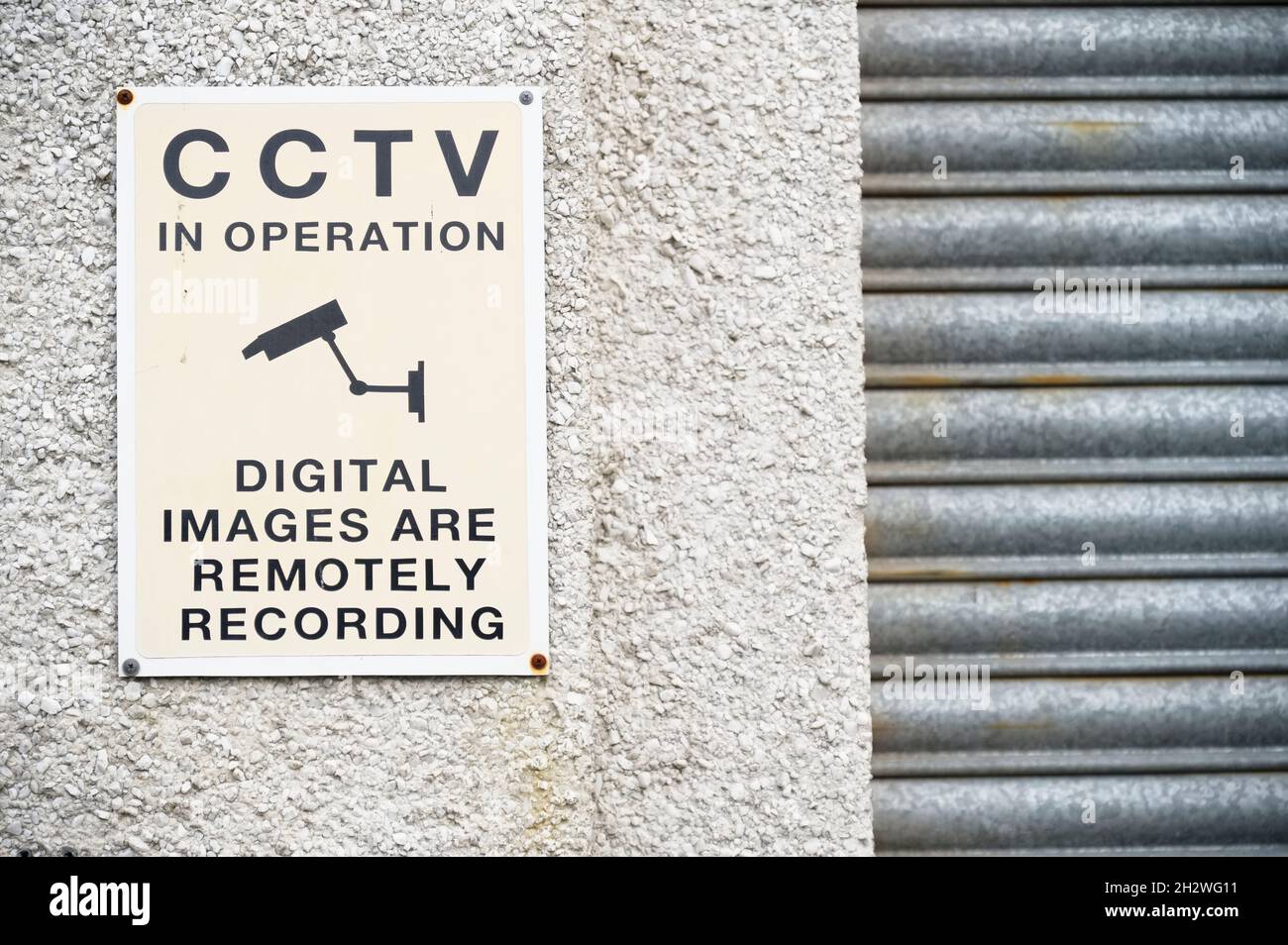 CCTV in operation 24 hours premises protected sign Stock Photo - Alamy