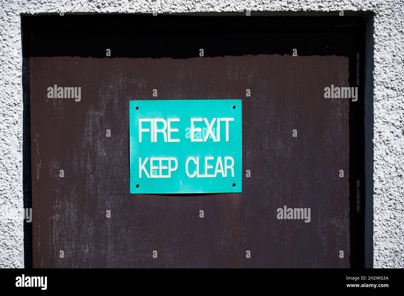 Fire exit keep clear sign on construction building site door Stock ...