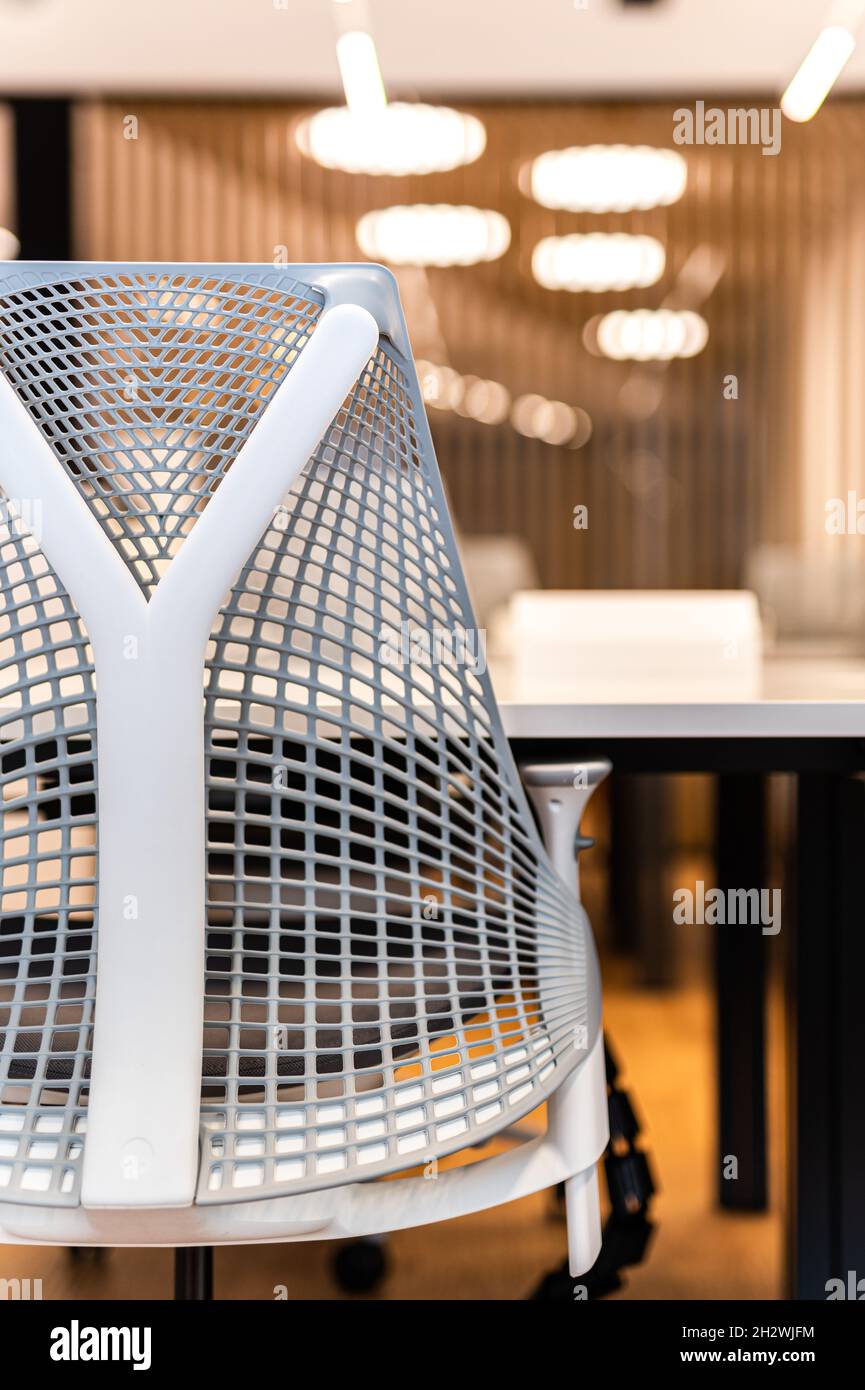 Modern office interior. White chair and table in a modern corporation ...