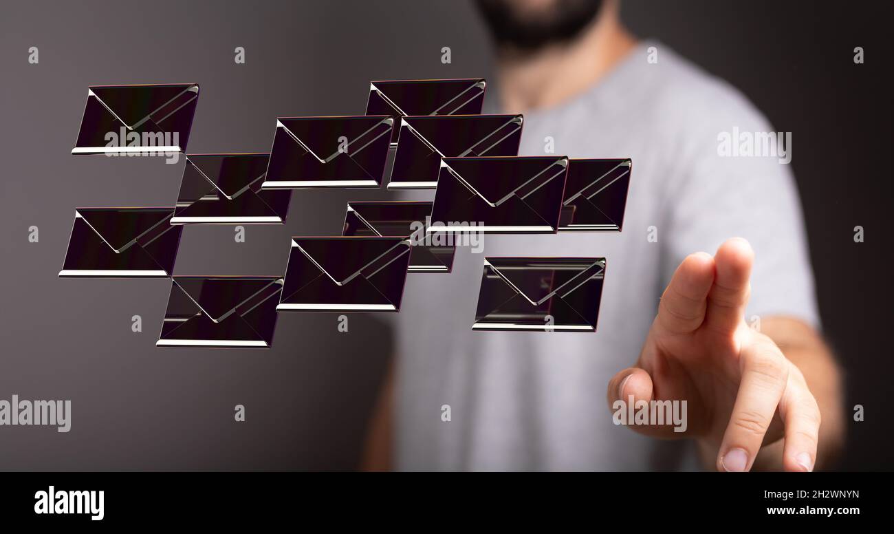 A male's hand pointing to illustrated email icons Stock Photo - Alamy