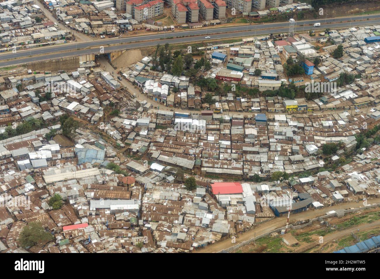 Aerial view of a section of Kibera slum showing makeshift shack housing ...