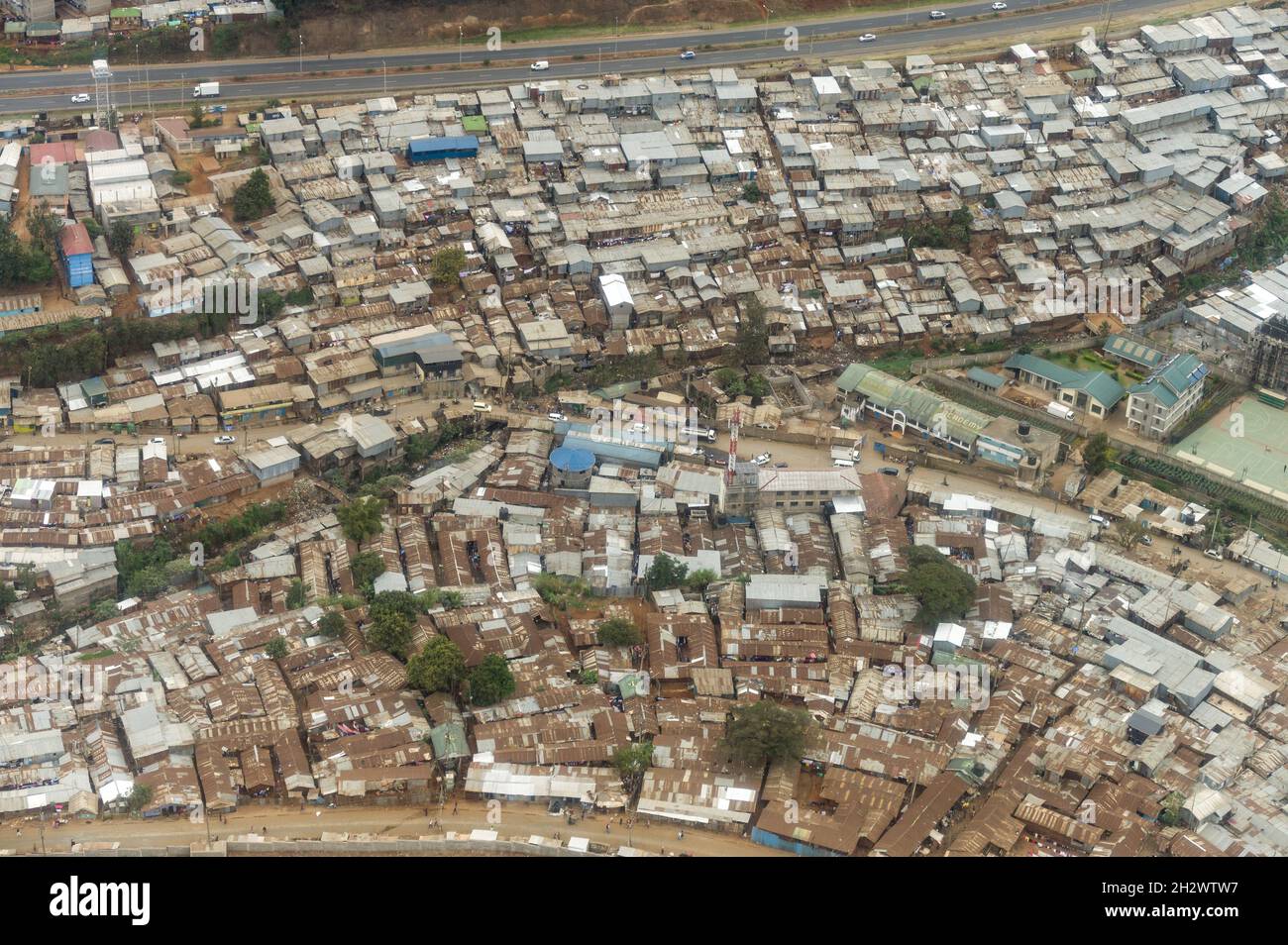 Aerial view of a section of Kibera slum showing makeshift shack housing ...