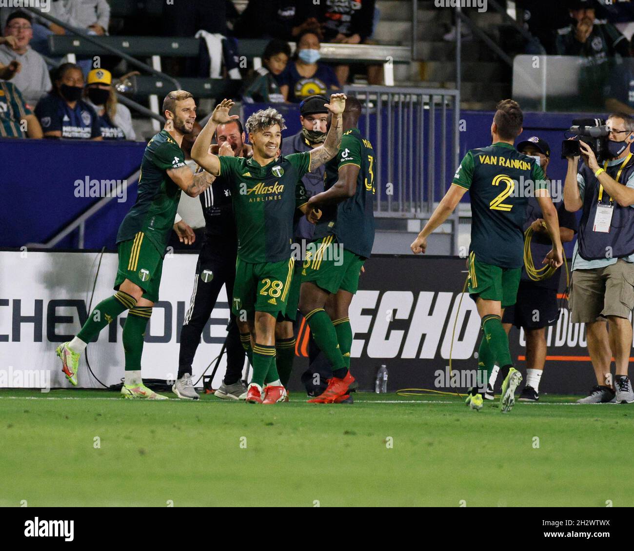 Timber Defender Pablo Bonilla (28) and other members of the Timbers ...