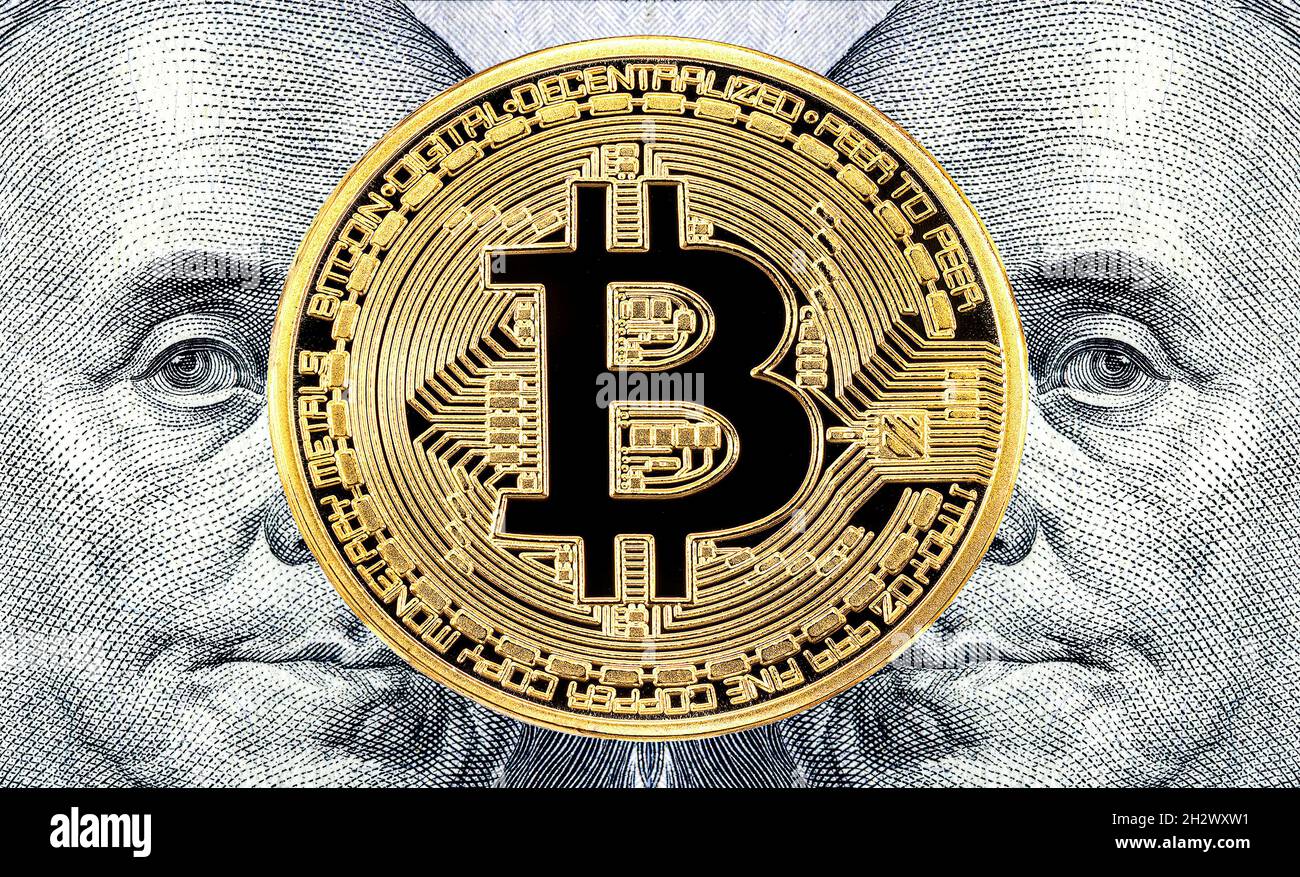 Golden coin bitcoin and Benjamin Franklin portrait from one hundred ...