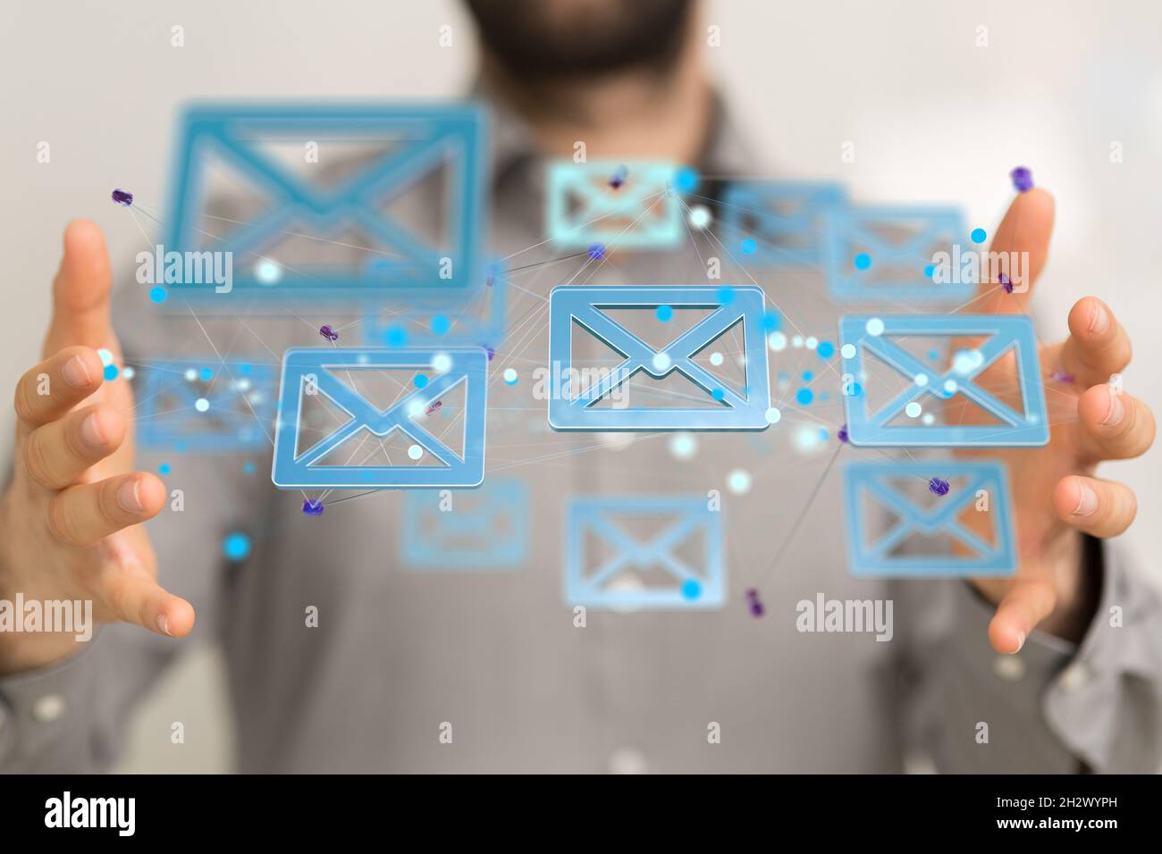 A male's hand pointing to illustrated email inbox electronic ...