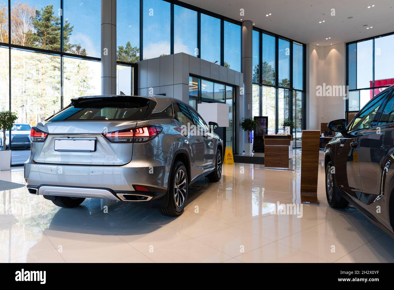 dealership of premium cars, interior photography of a modern showroom ...