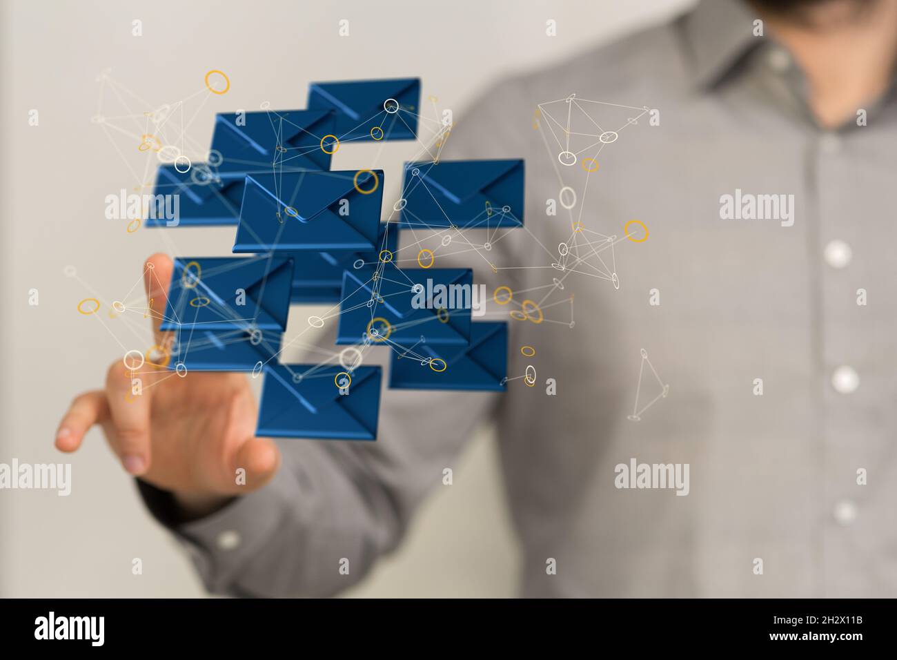 A male's hand pointing to illustrated email inbox electronic ...