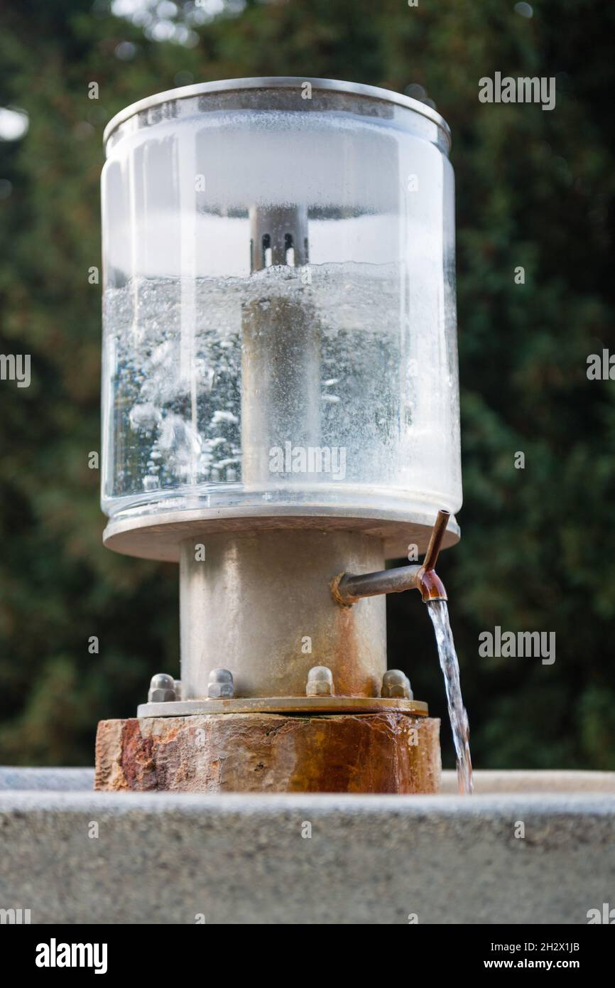 Public natural healing mineral water, spring with mineralized water in ...