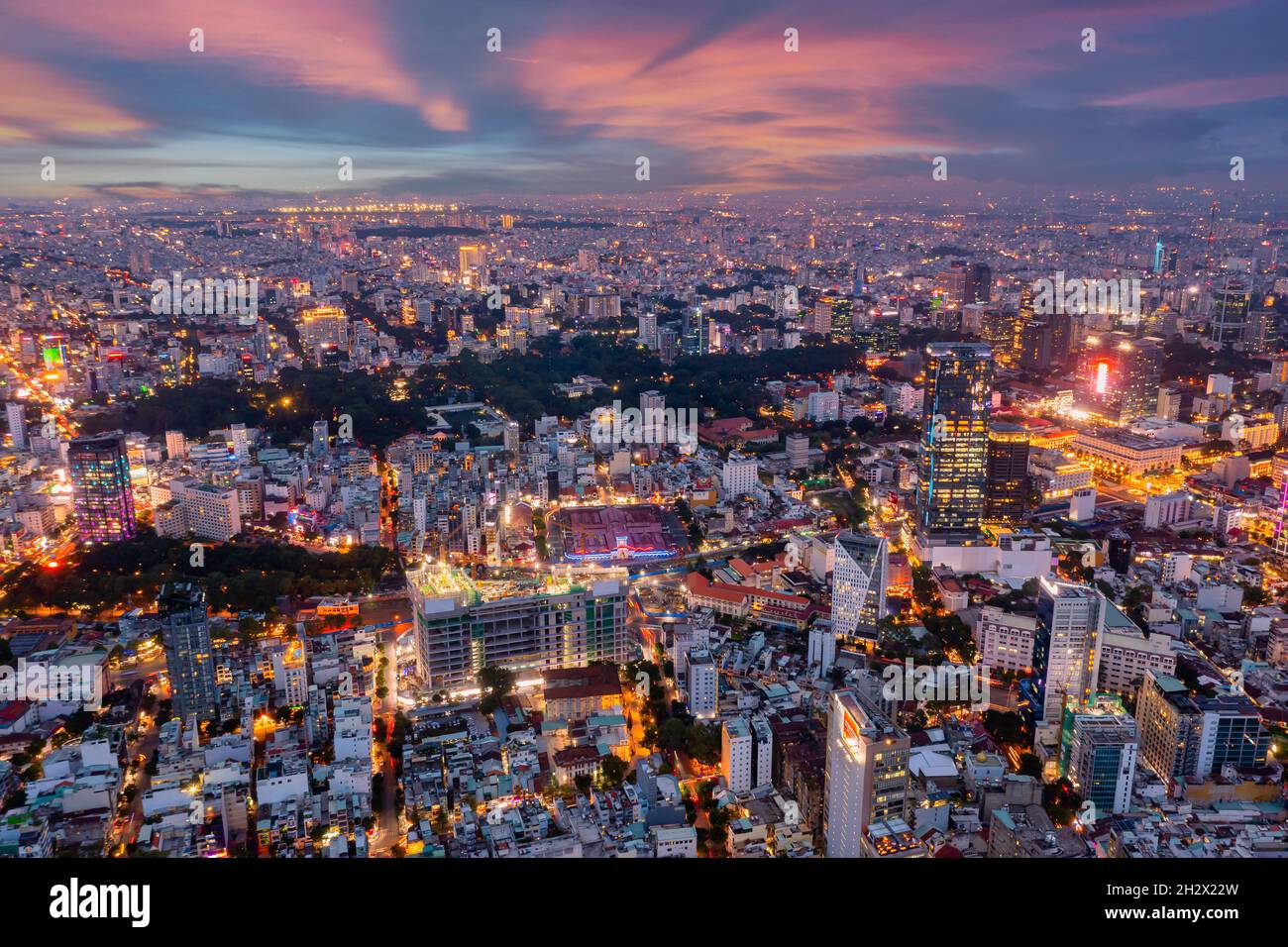 Drone view photo of Saigon downtown district in the sunset Stock Photo ...