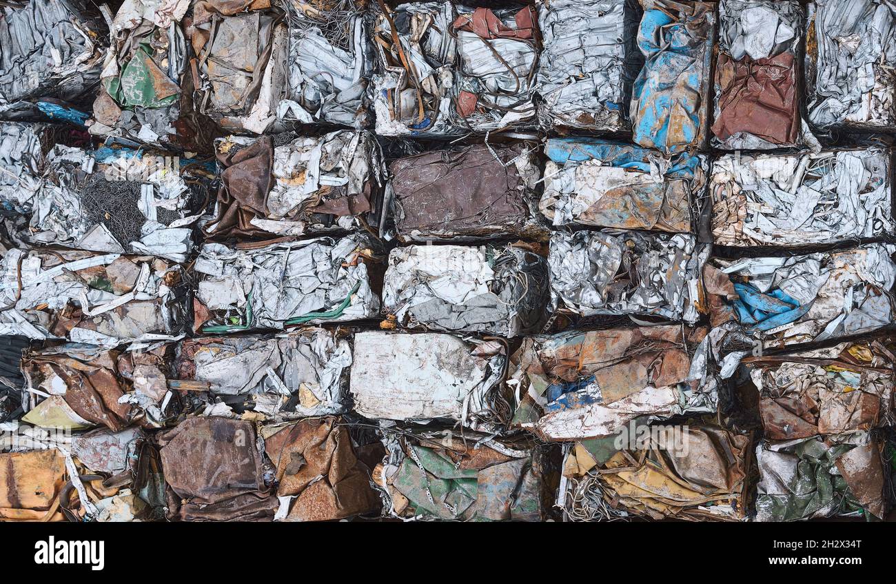 Scrap metal pressed into cubes for recycling, top view Stock Photo - Alamy