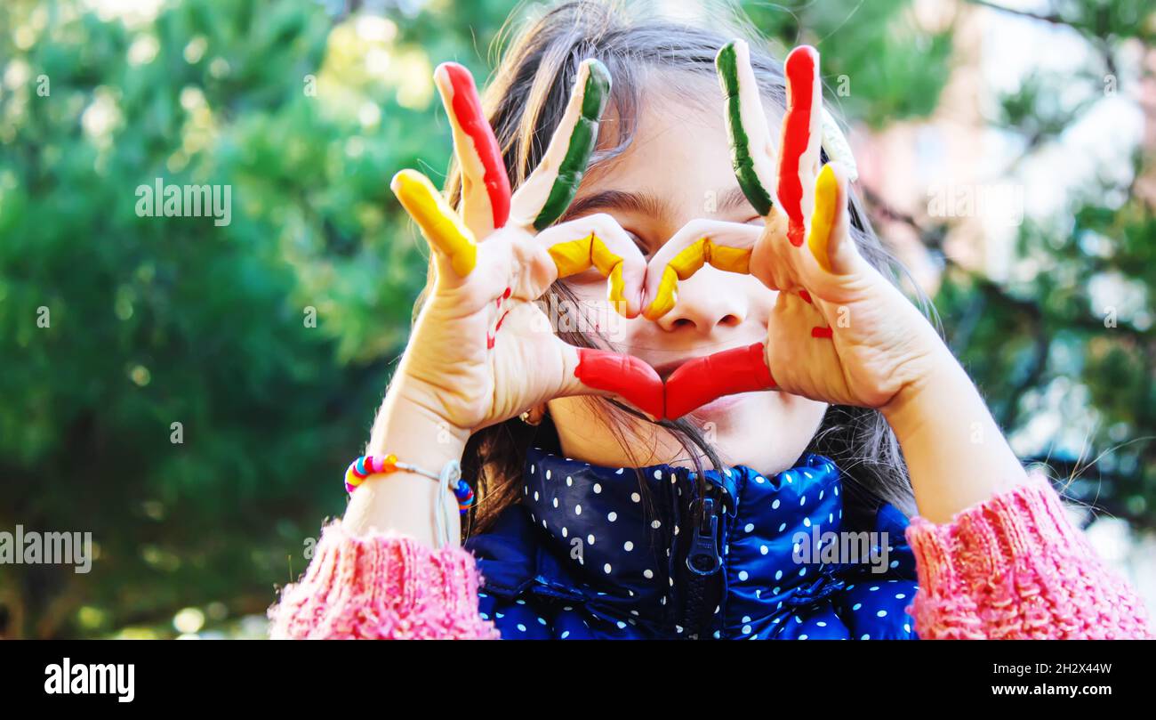 children hands in colors. Summer photo. Selective focus. nature Stock ...
