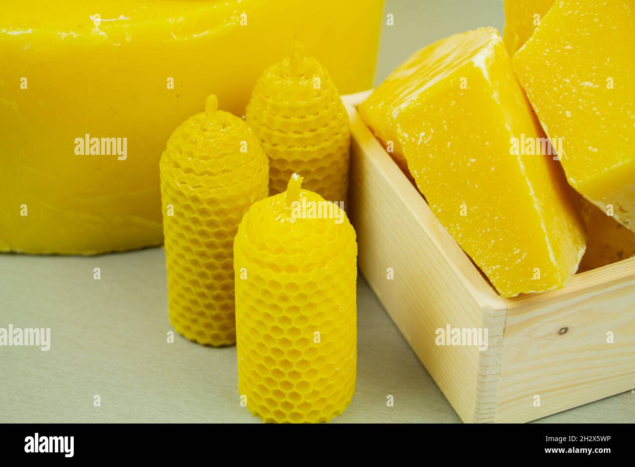 large pieces of natural beeswax, close-up, raw materials for candles ...