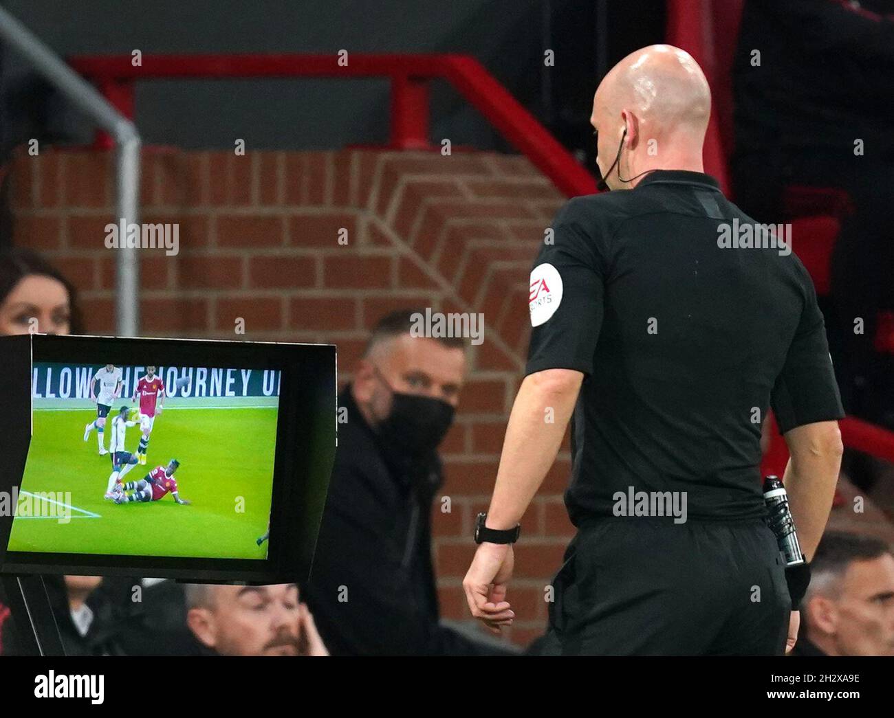 Referee Anthony Taylor consults VAR after a tackle during the Premier ...