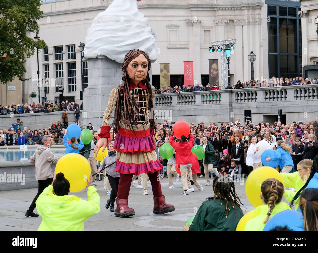 Trafalgar Square, London, UK. 24th Oct 2021. Little Amal, the giant ...