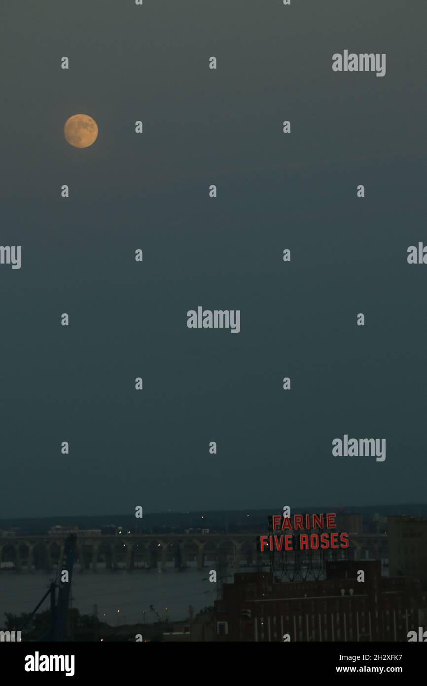 Montreal's evening: Saint Lawrence River and the moon Stock Photo - Alamy
