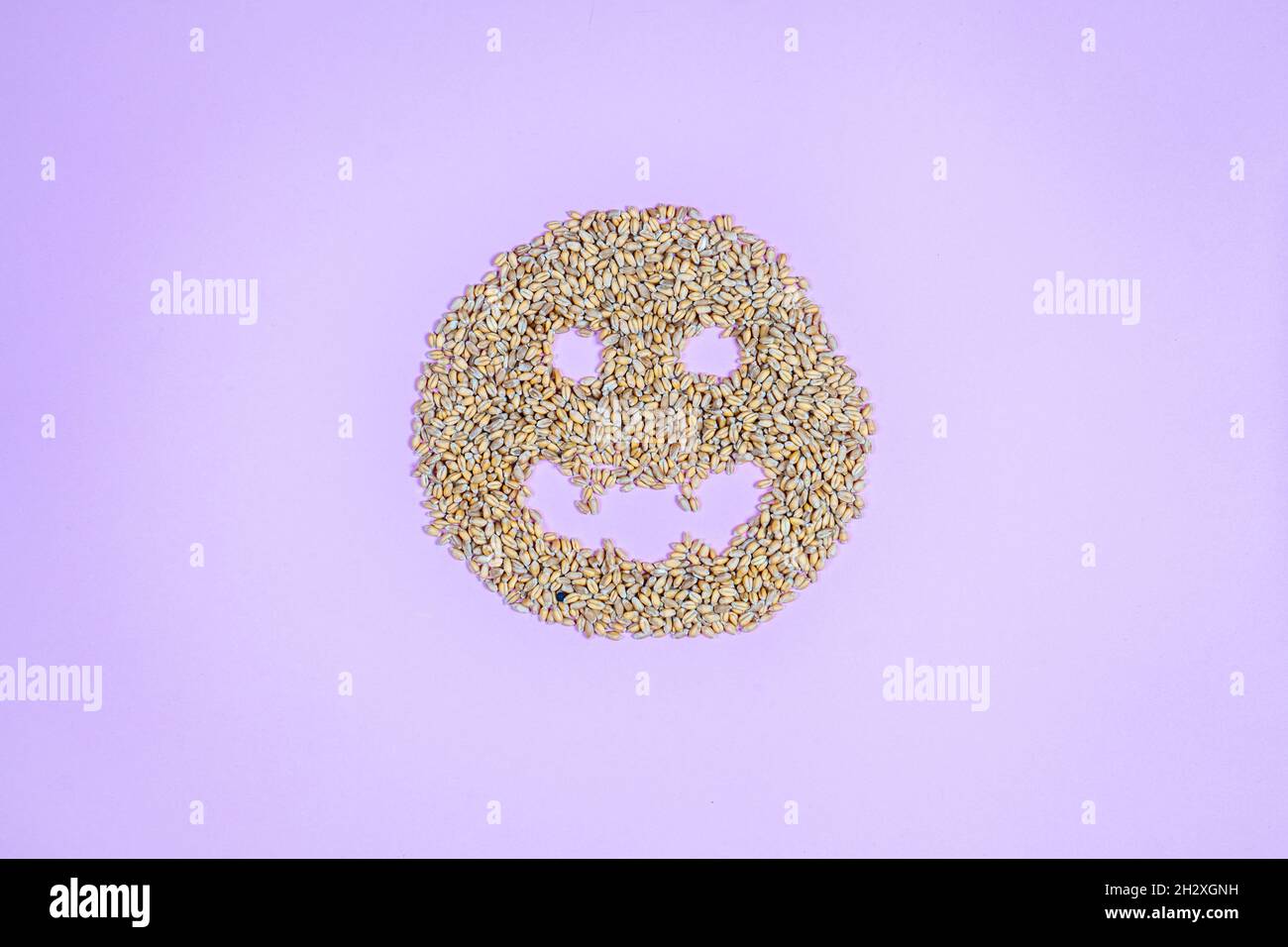 A pile of raw spelt grains in the form of an evil circle Stock Photo ...