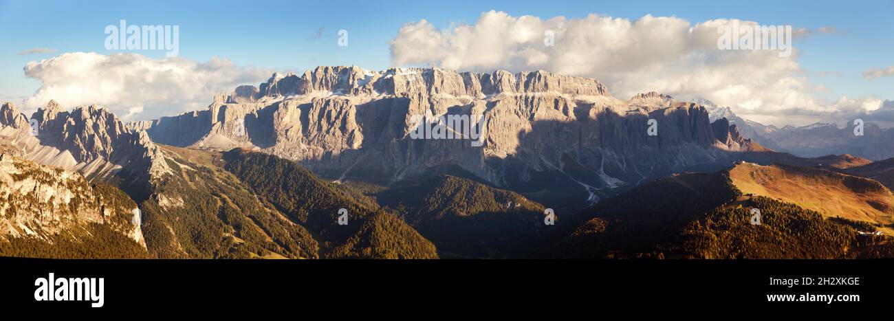 Evening view of Sella gruppe or gruppo di Sella with clouds and Selva ...