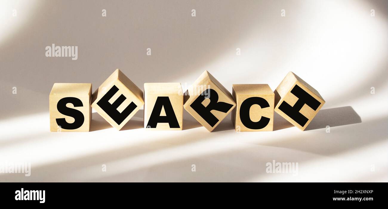 The cubes have the word SEARCH written on a white background. Place to ...