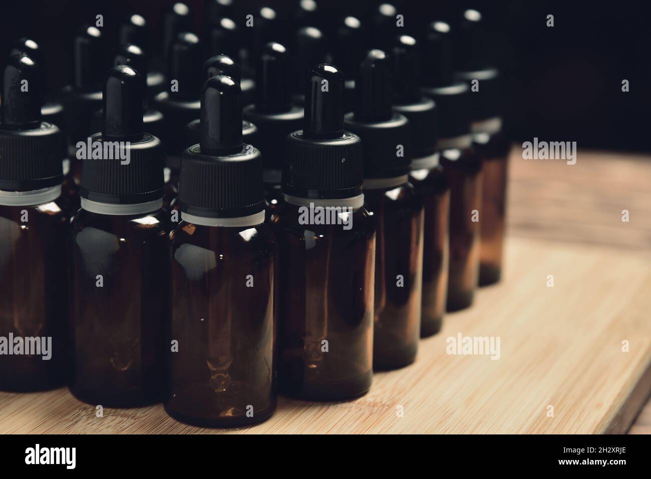 Glass containers for liquids, Cosmetic bottles with a pipette close-up ...