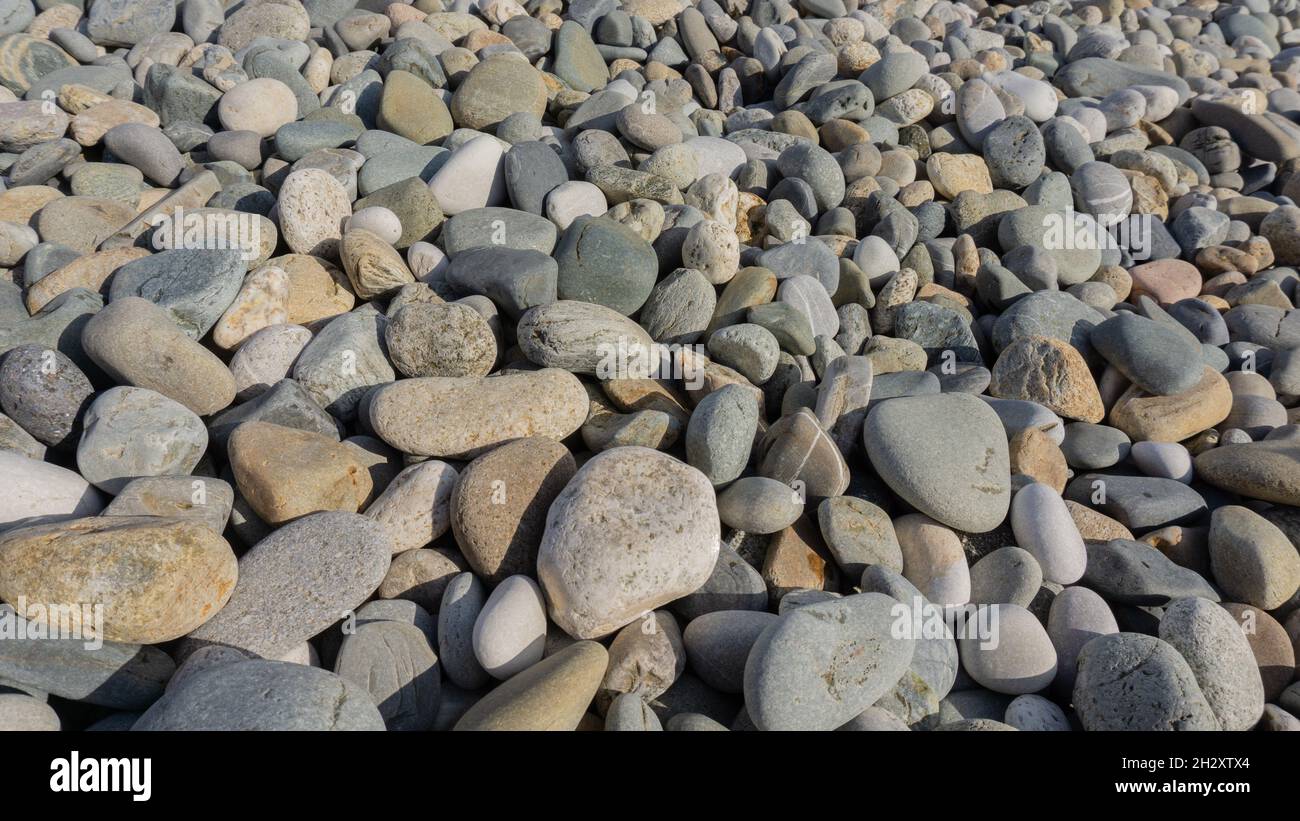 Sea stones background with small pebbles or stone in garden or in the ...
