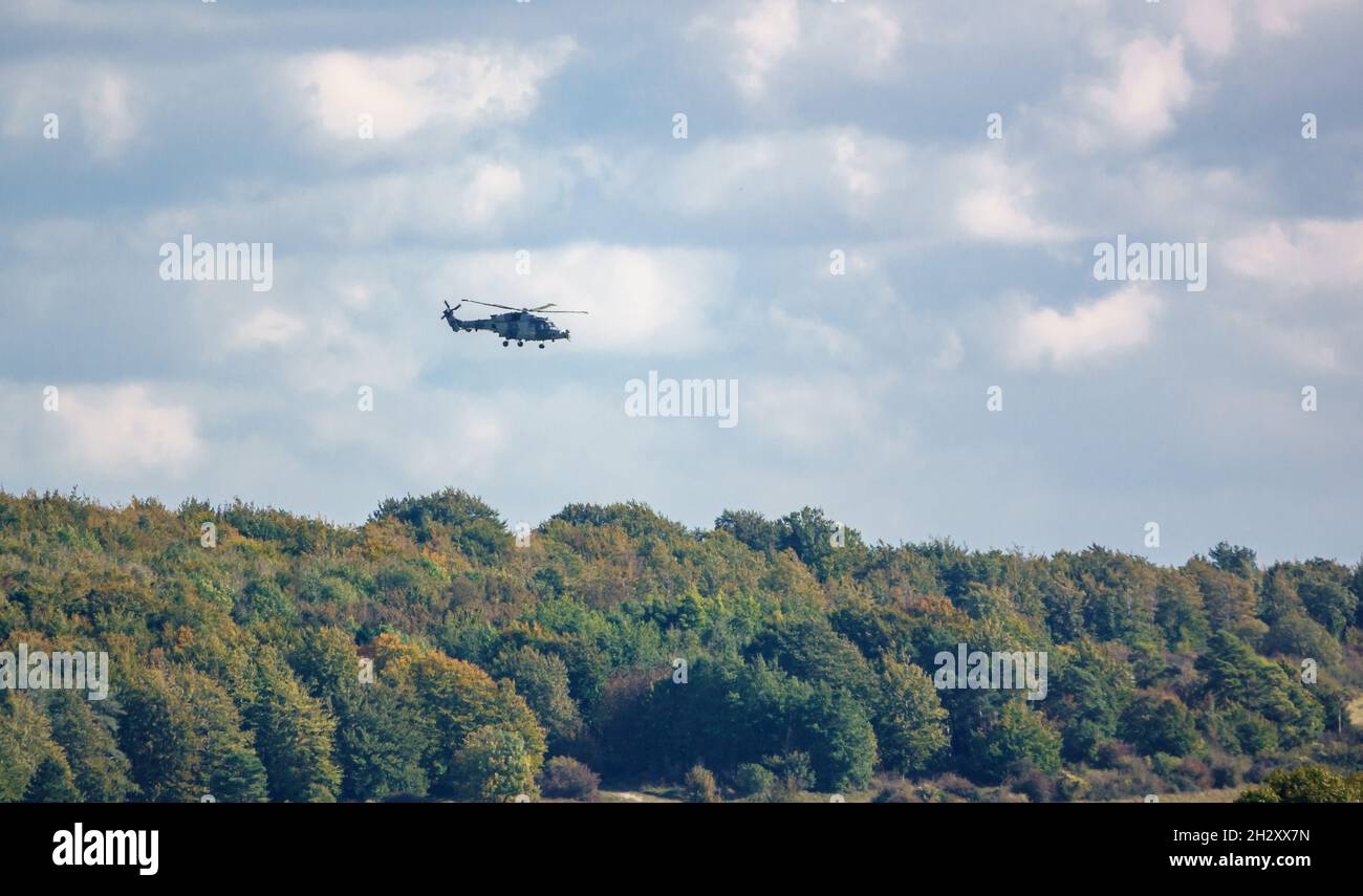 British army AgustaWestland AW159 Wildcat AH1 helicopter flying over ...