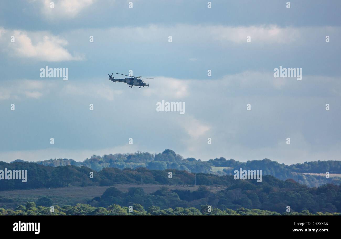 British army AgustaWestland AW159 Wildcat AH1 helicopter flying over ...
