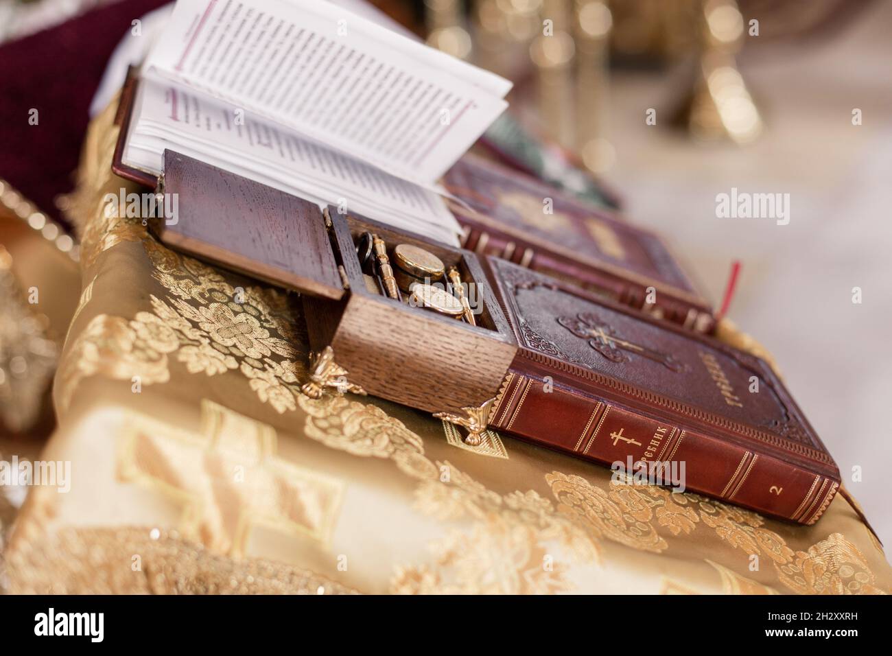 Bible on the table at the priest in the church Stock Photo - Alamy