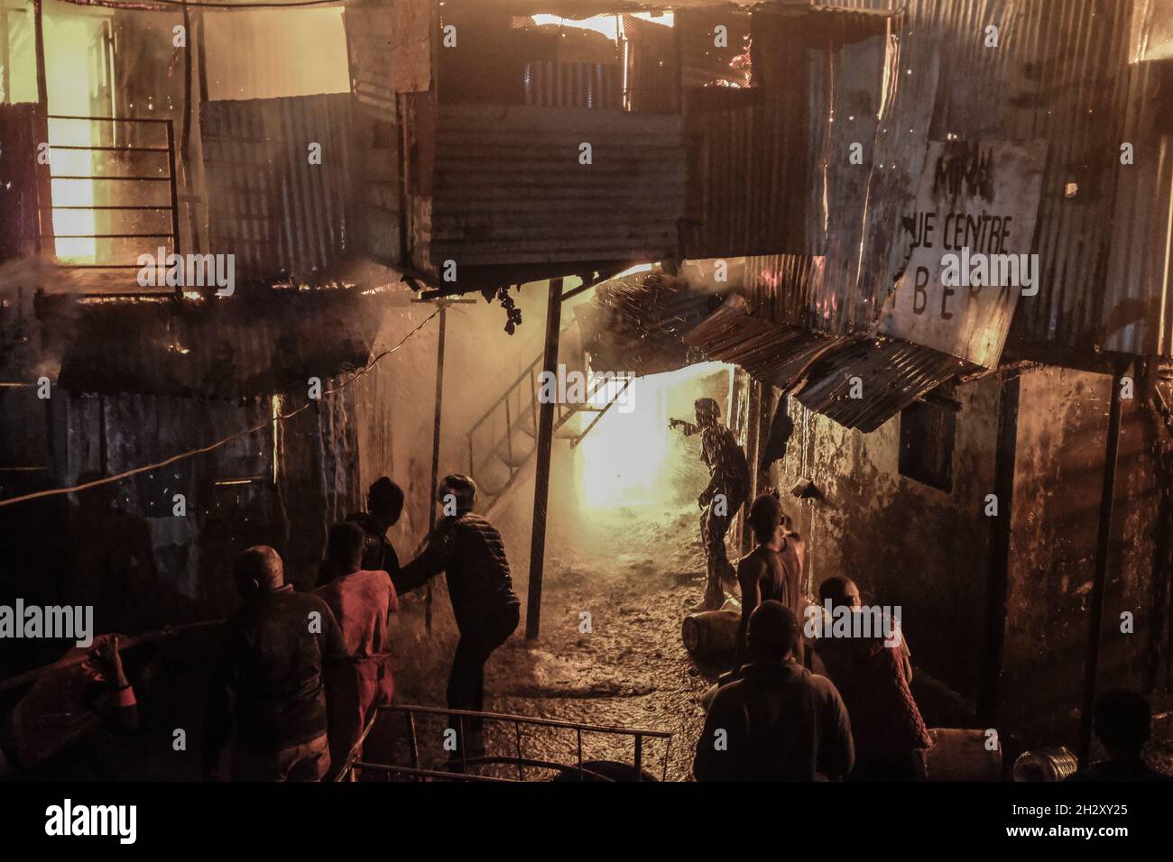 Nairobi, Kenya, 23 Oct 2021, Homeless residents and firefighters ...