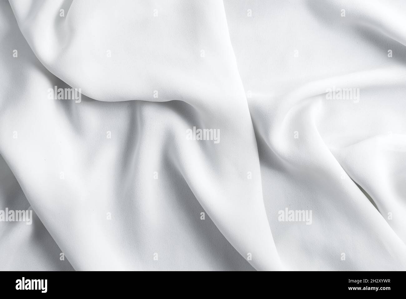 Crumpled textile fabric background of light grey color Stock Photo - Alamy