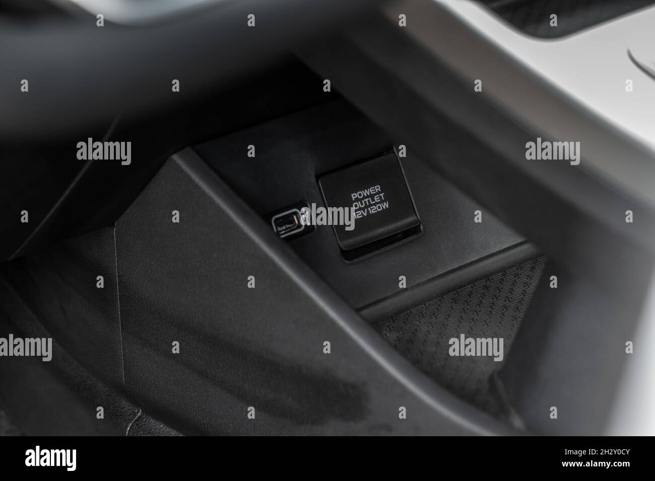 Opened car USB port in the car for connecting device. Power output of ...