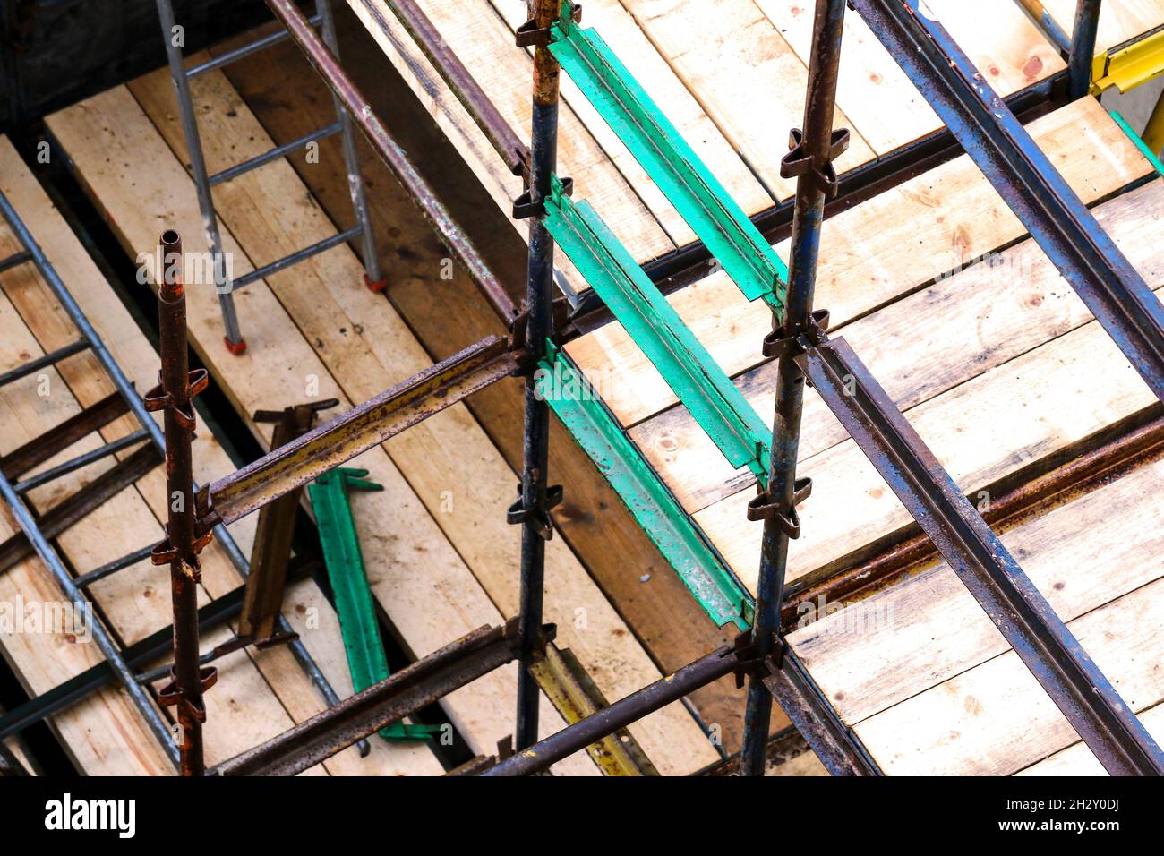Diagonal lines and linear patterns of metal and wood timber platform ...