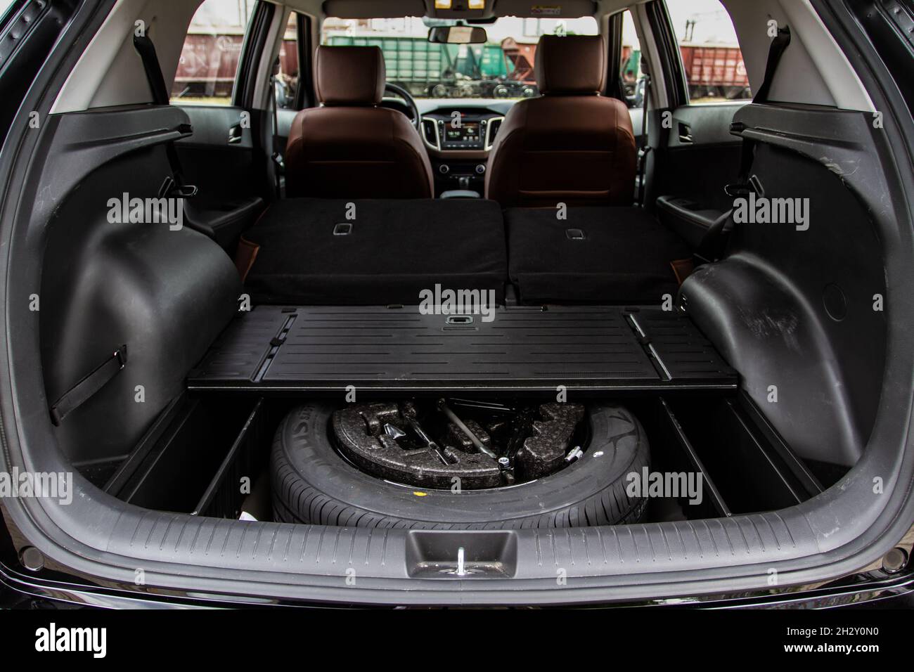 Huge, clean and empty car trunk in interior of compact suv. Rear view ...
