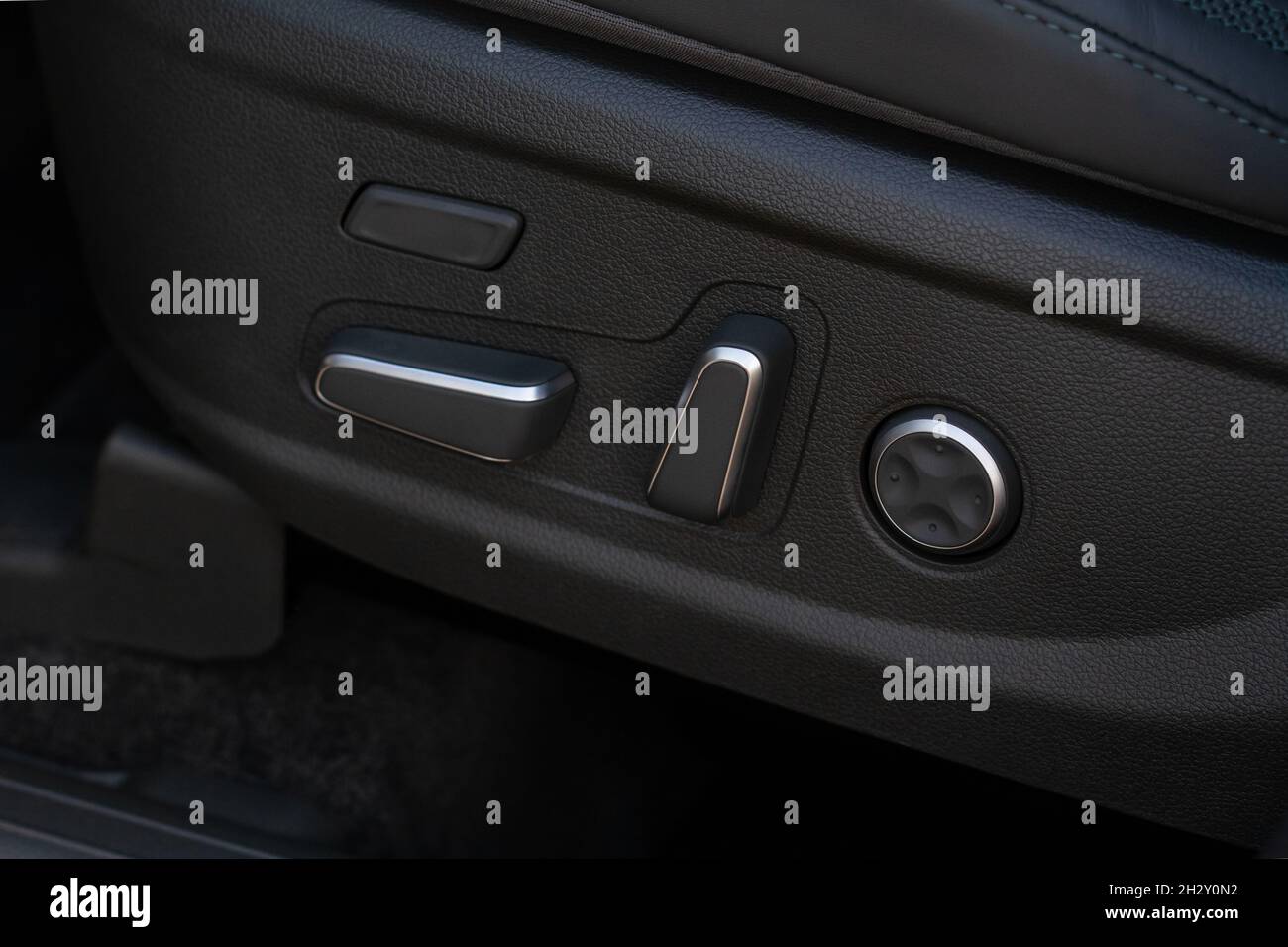 Electric car seat adjustment control panel close up view. Adjustable ...