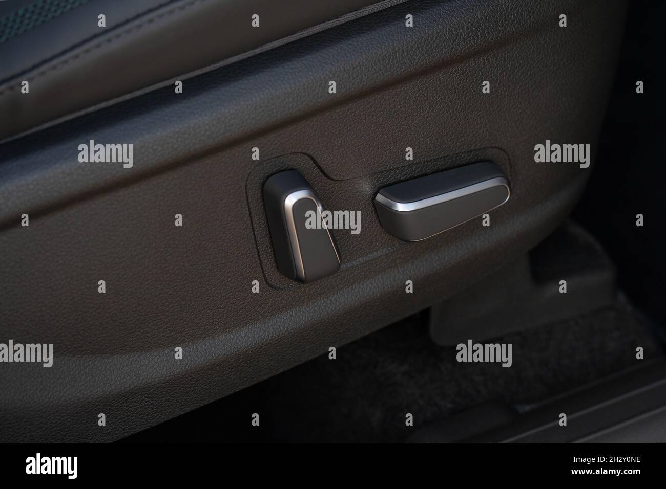Electric car seat adjustment control panel close up view. Adjustable ...