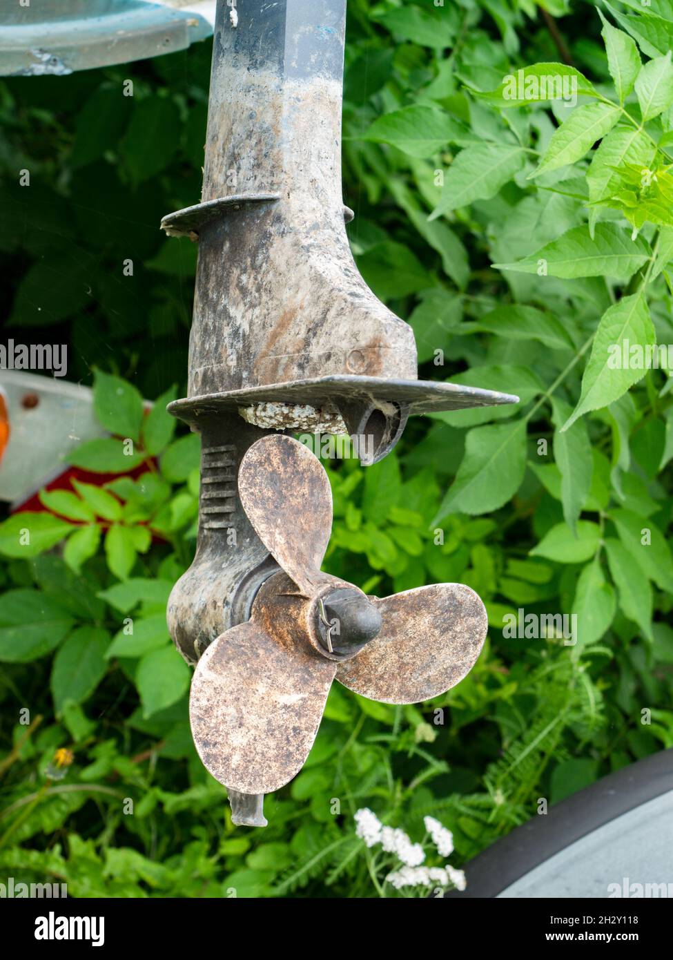 Rusty propeller in an old fishing boat in dry dock, technical part ...