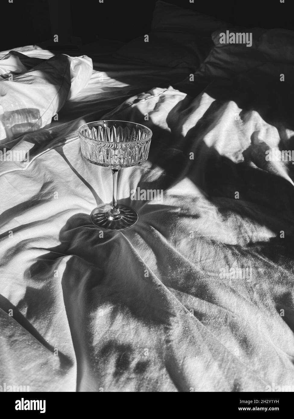 crystal glass that flashes on a white fabric background from the autumn ...