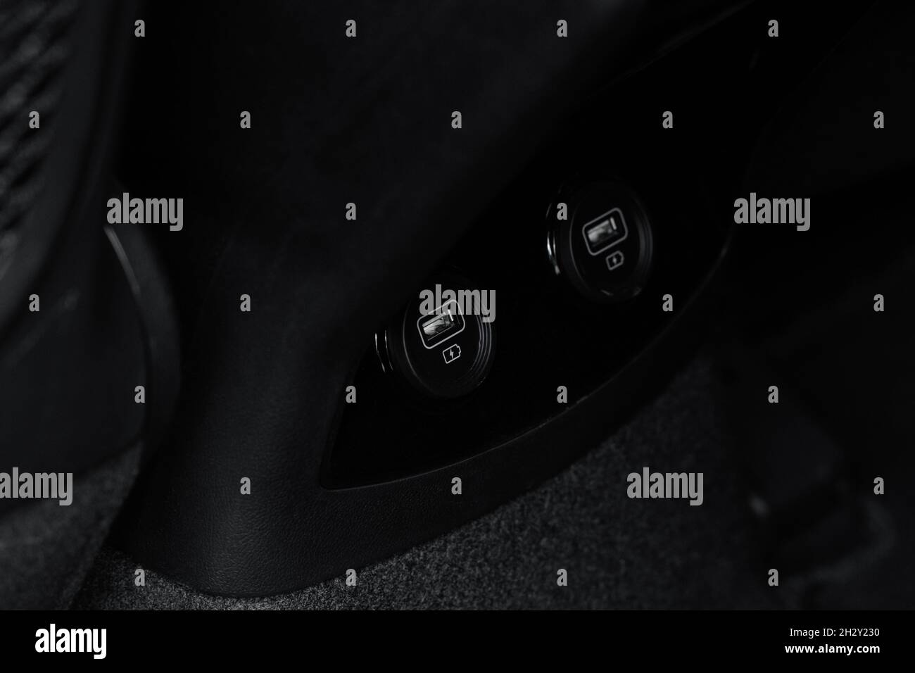 Opened car USB port in the car for connecting device. Power output of ...