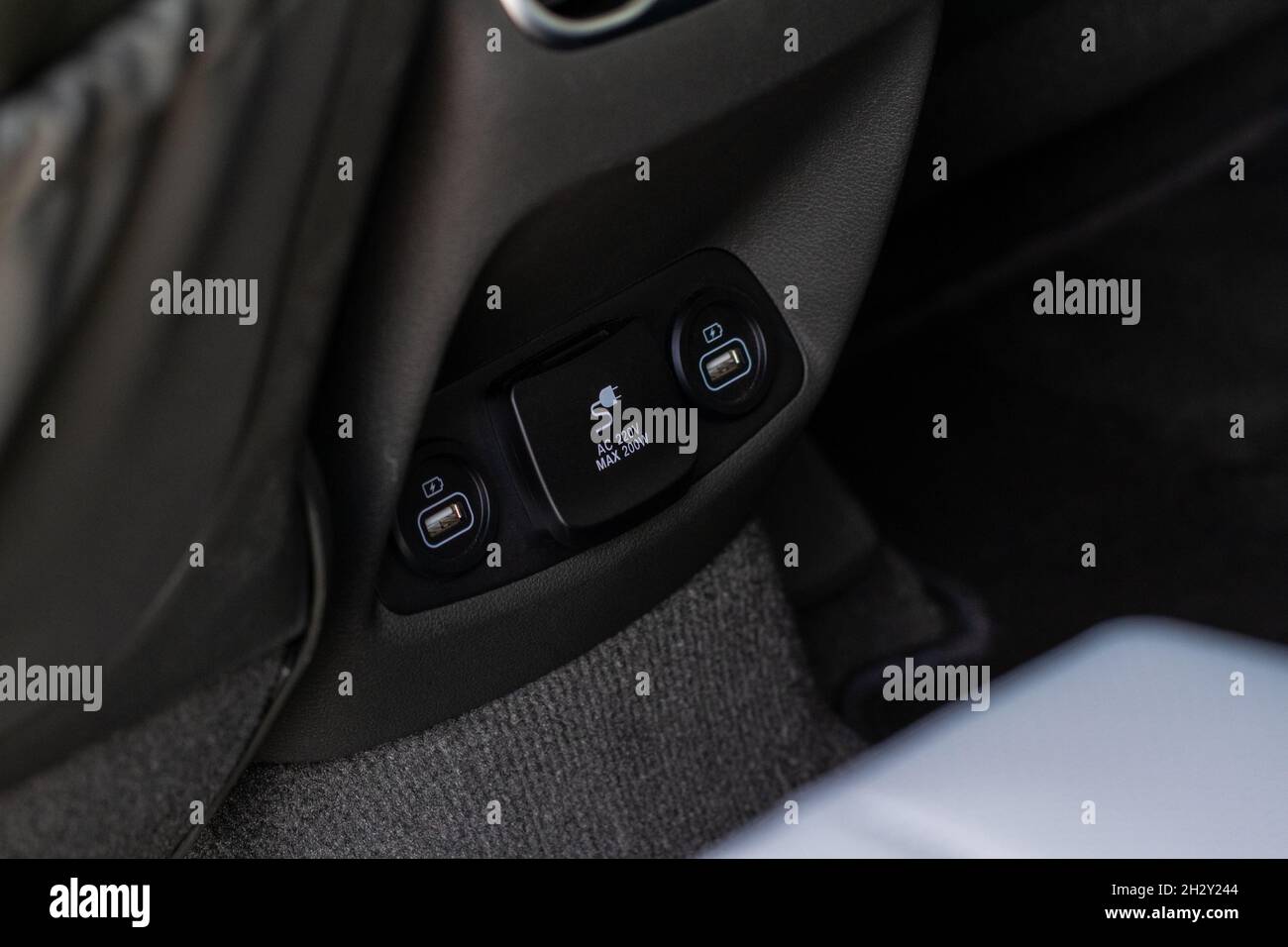 12V and 220v power outlet socket in the car. Closed sockets Stock Photo ...