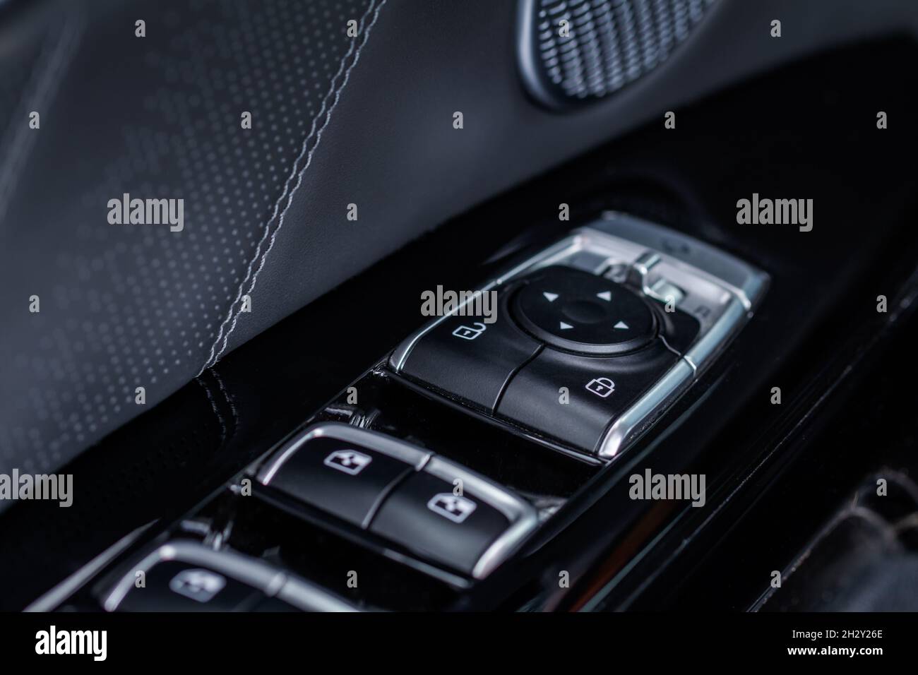 Car door lock switch close up. A car lock button. Car door handle with ...