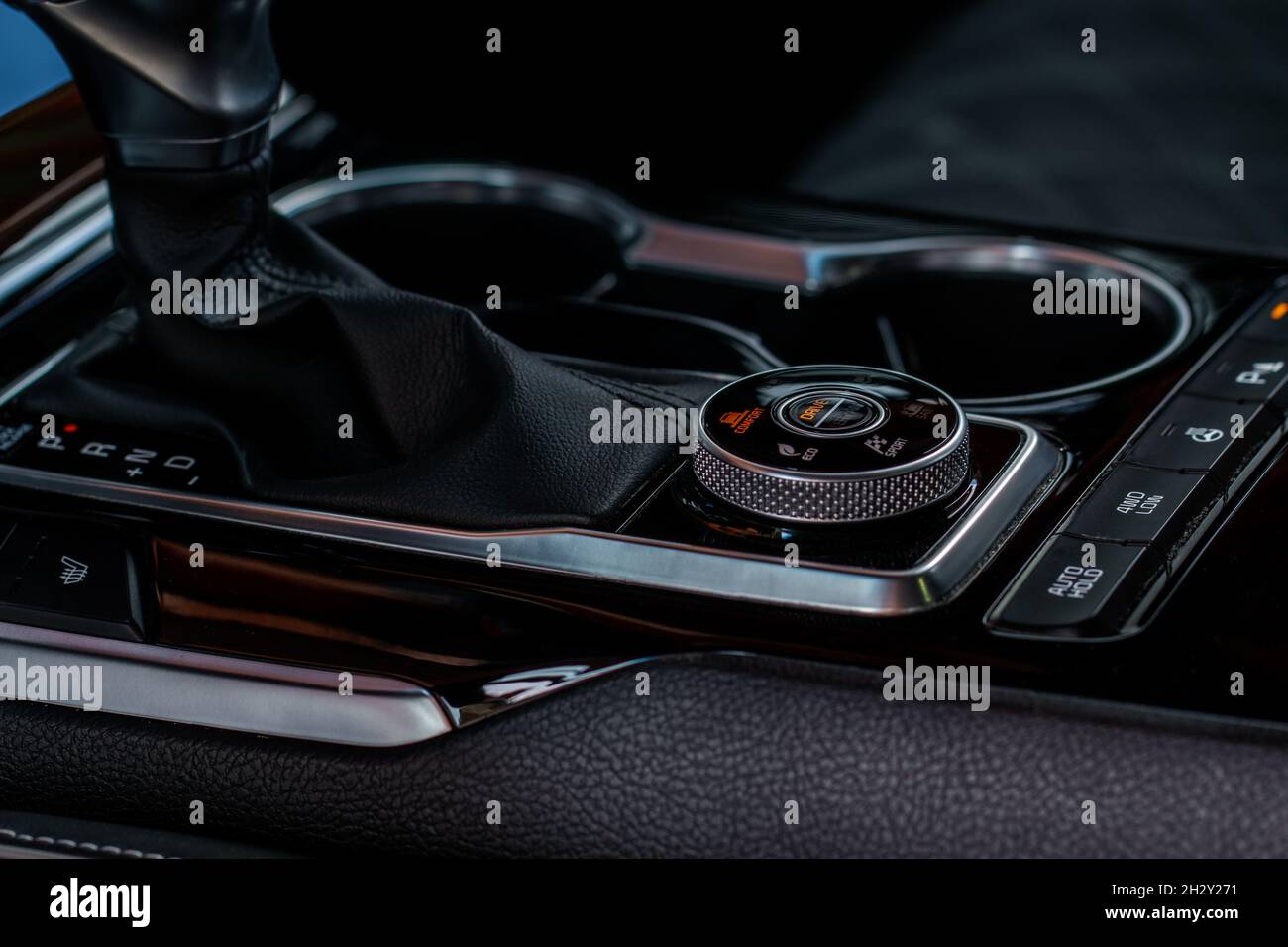 Drive selector button. Car interior, offroad drive controller closeup ...