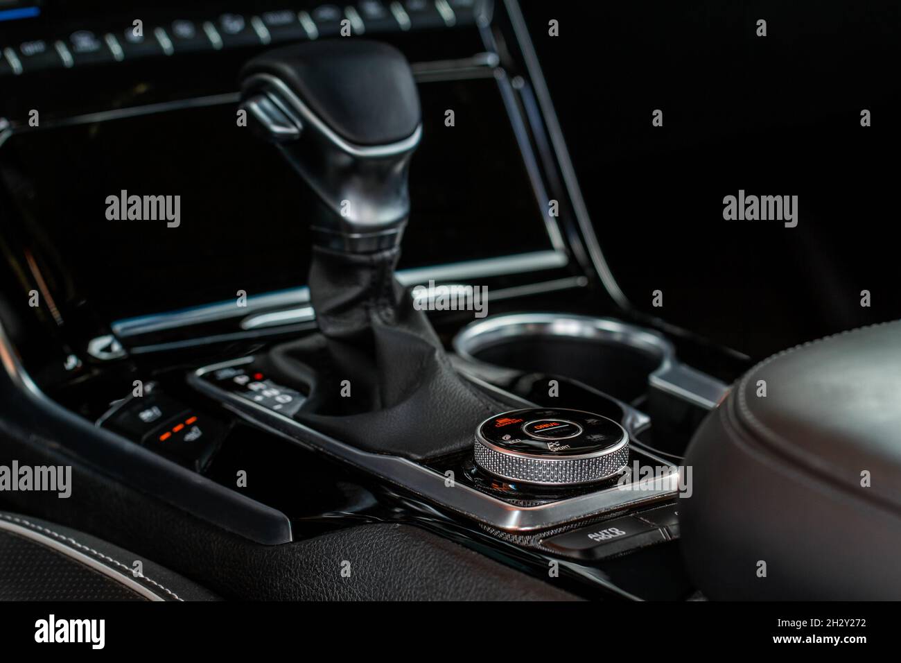 Modern automatic gearbox. Close up of the gearbox transmission handle. Automatic gear stick ...