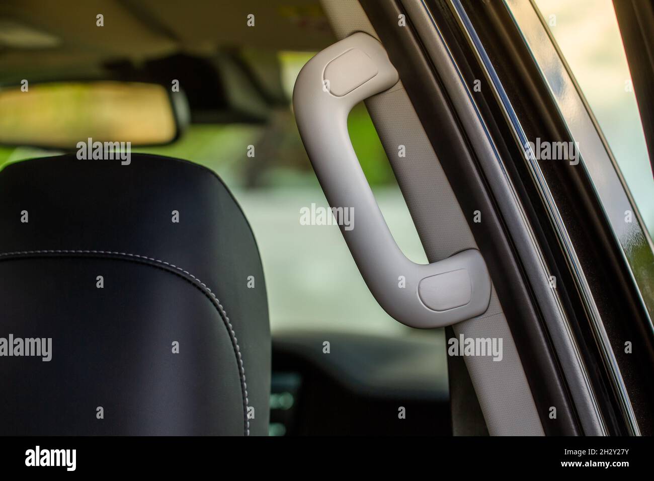Modern Car Grab Handles car interior details. Car grab handler for the passenger. Car ceiling handle Stock Photo Alamy