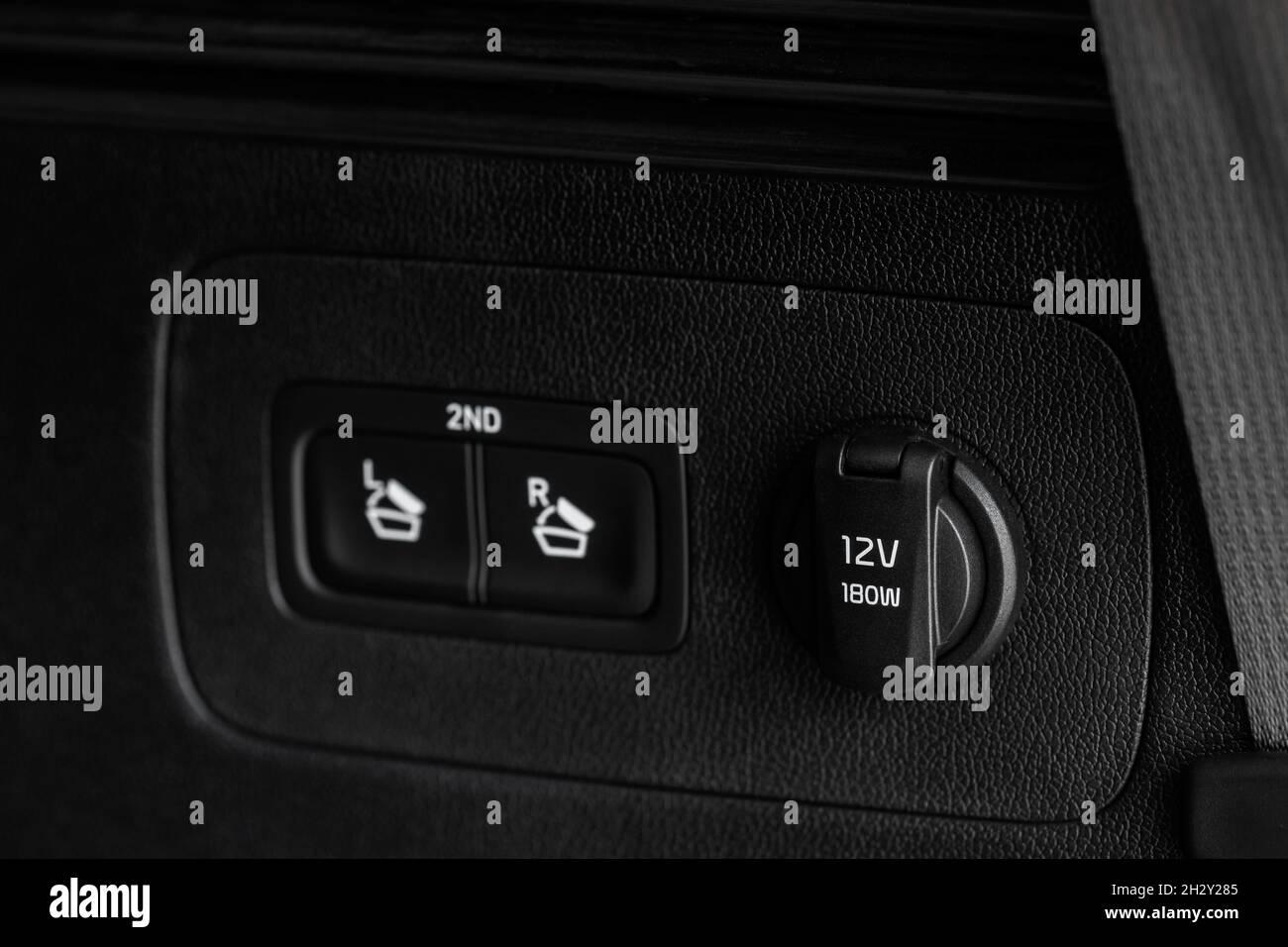 12V power socket in a car. Outlet socket in a car Stock Photo - Alamy