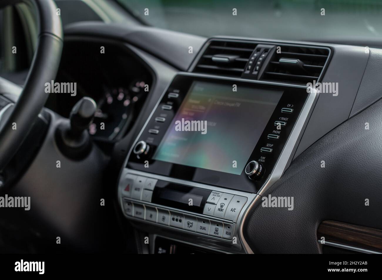 Modern car media display in the interior of the car. Touchscreen ...