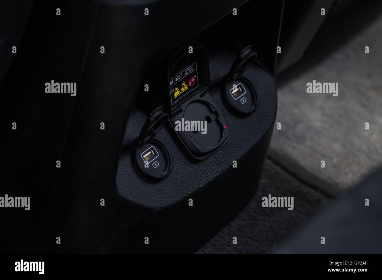 12V and 220v power outlet socket in the car. Opened sockets Stock Photo ...