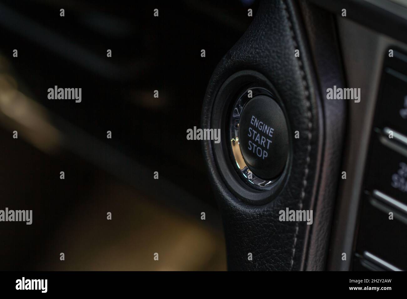 Close up engine car start stop button. Modern car interior details ...