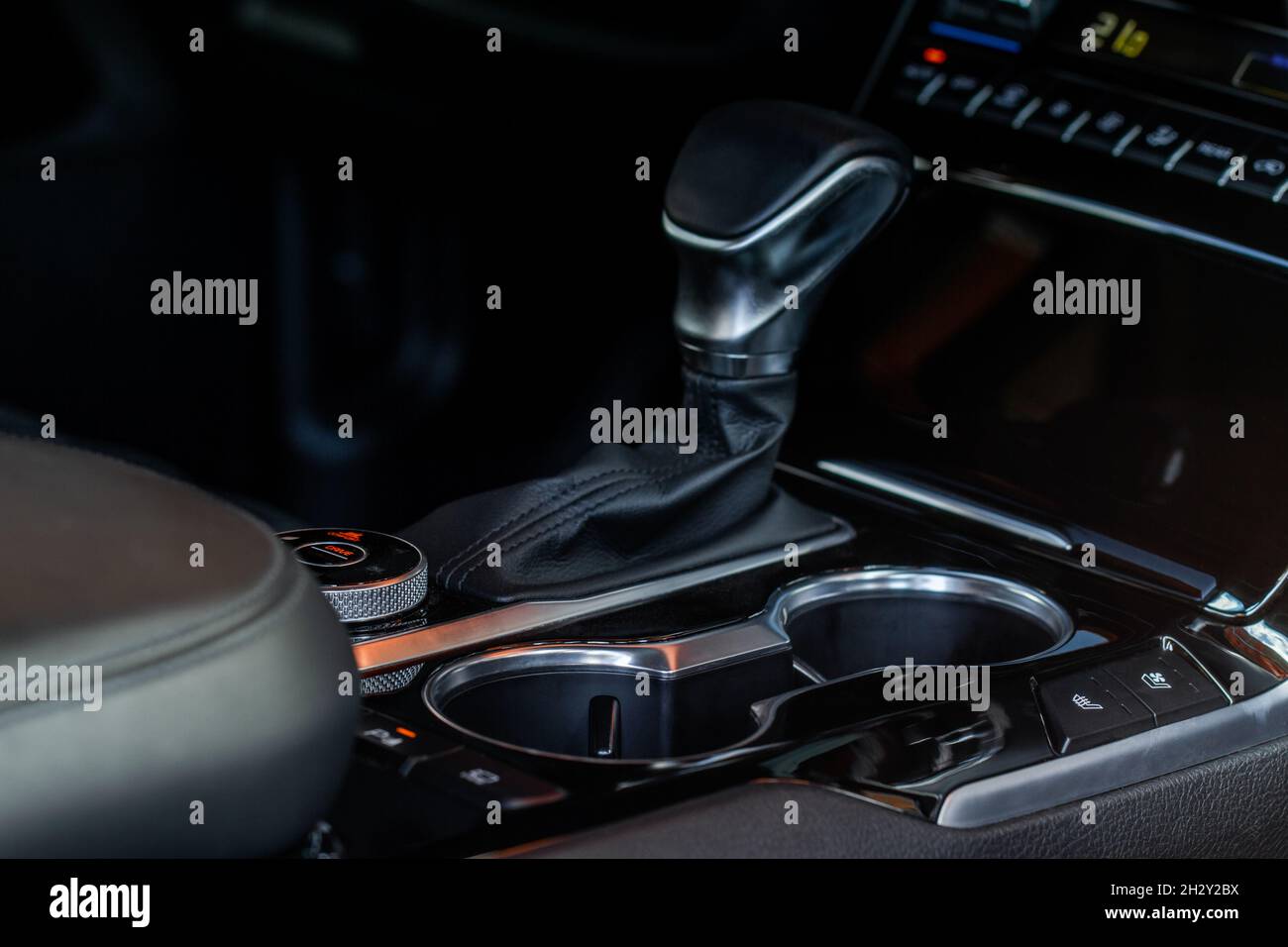 Cup holders inside modern car interior. Interior view of modern car ...