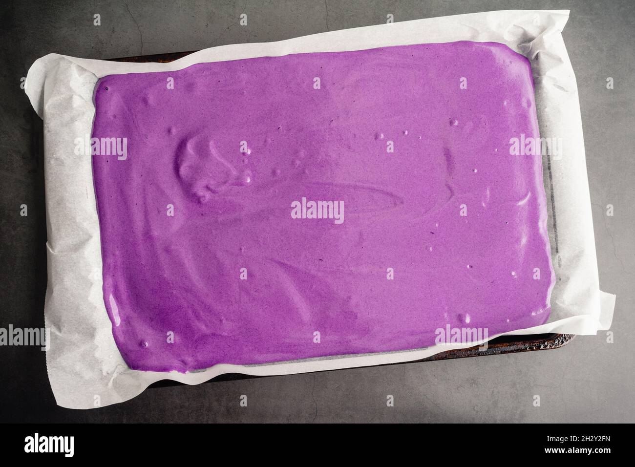 Uncooked Ube Cake Batter in a Sheet Pan: Raw cake batter made with ...