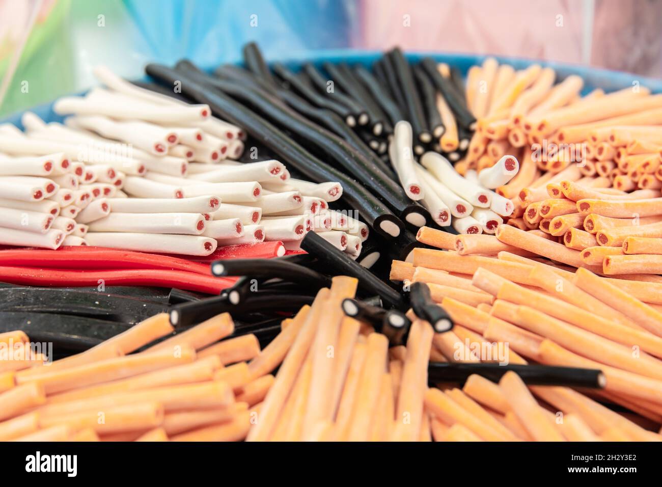 Sweet colored candies rope string shaped sweets Stock Photo - Alamy