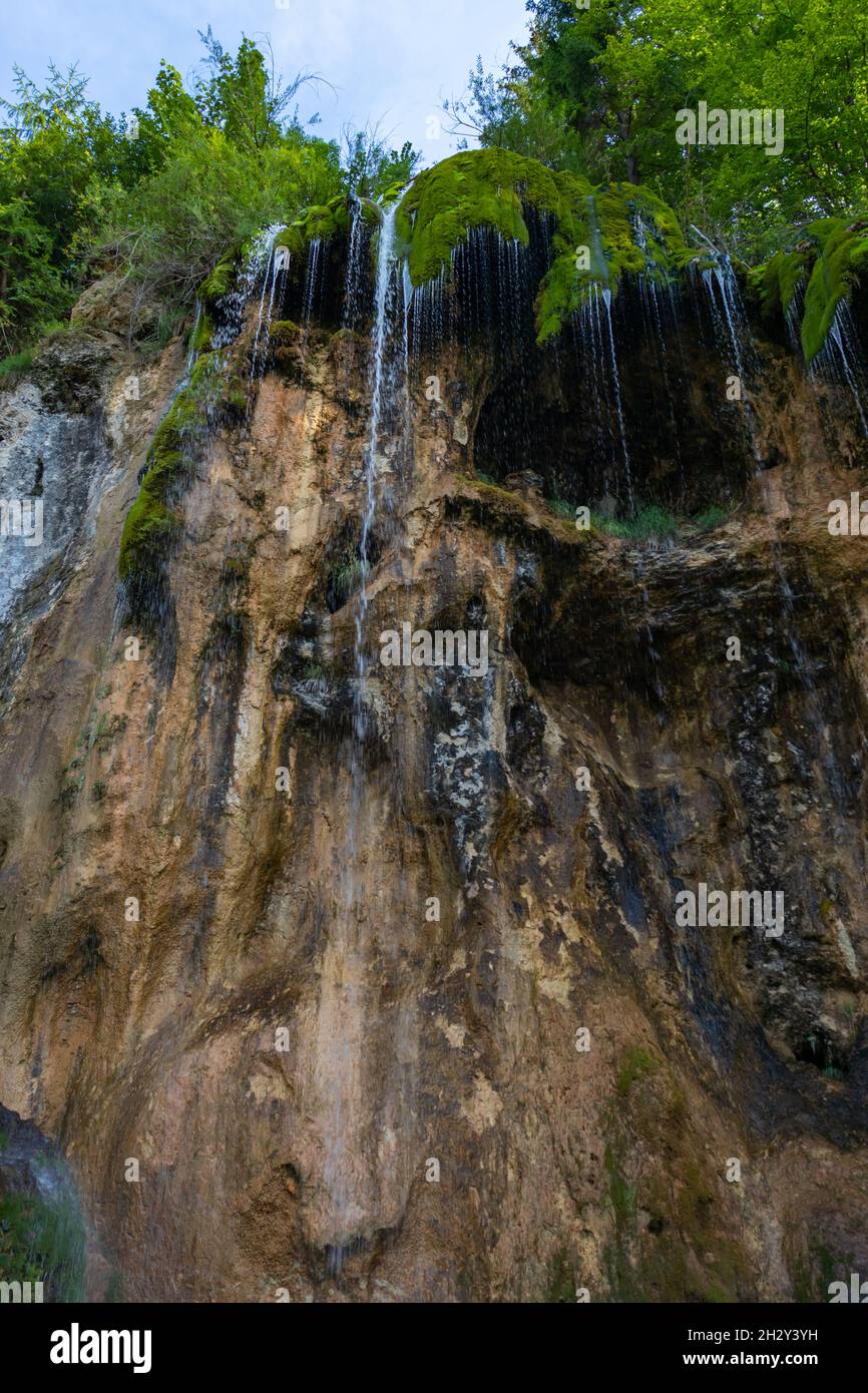 Bottom-up photo of the Pisoaia waterfall, in the Transylvania area ...